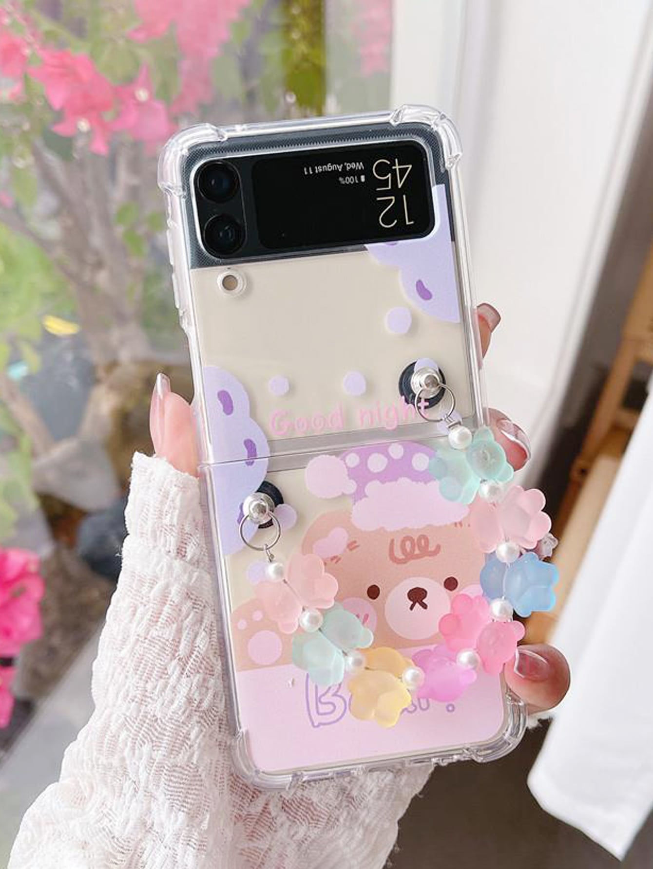Funda de celular transparente con estampado de oso de dibujos animados con correa de mano