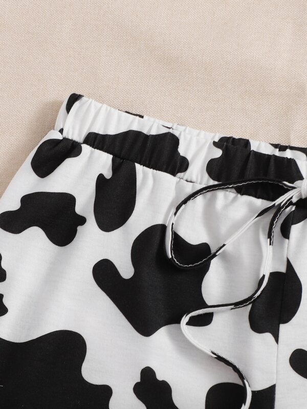 SHEIN Qutie Knot Waist Cow Print Shorts | SHEIN USA