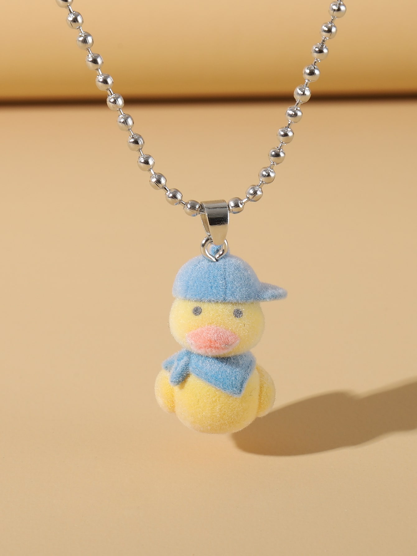 Collar con diseño de pato de dibujos animados