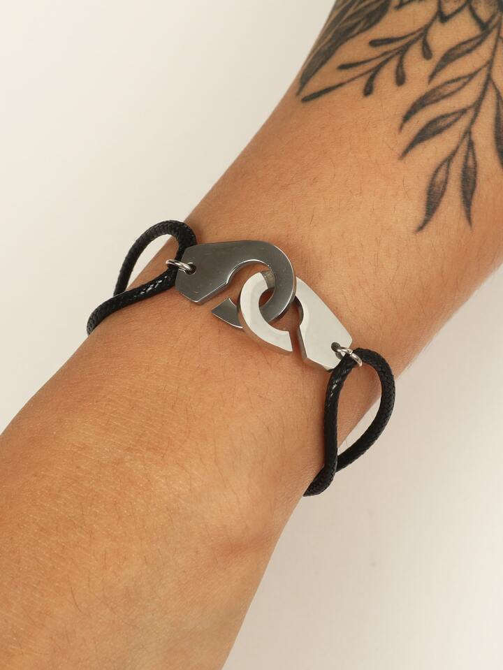 Handcuffs Around Wrist Tattoo