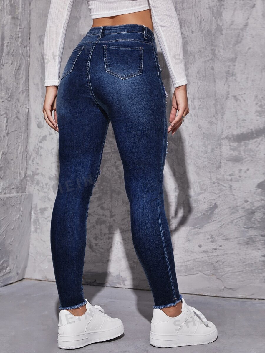 SHEIN Essnce Ripped Raw Trim Skinny Jeans | SHEIN UK