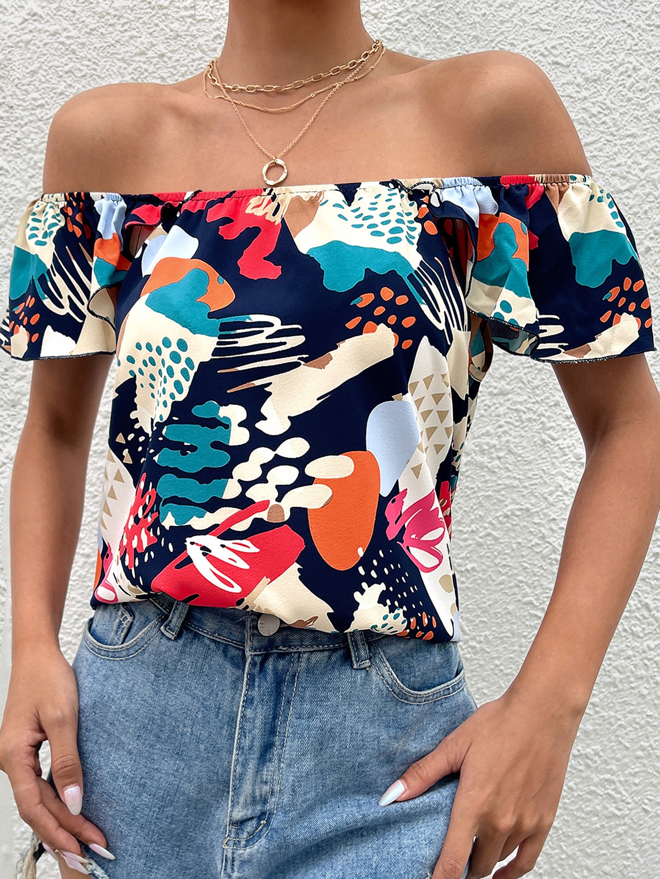 Blusa con estampado de hombros descubiertos