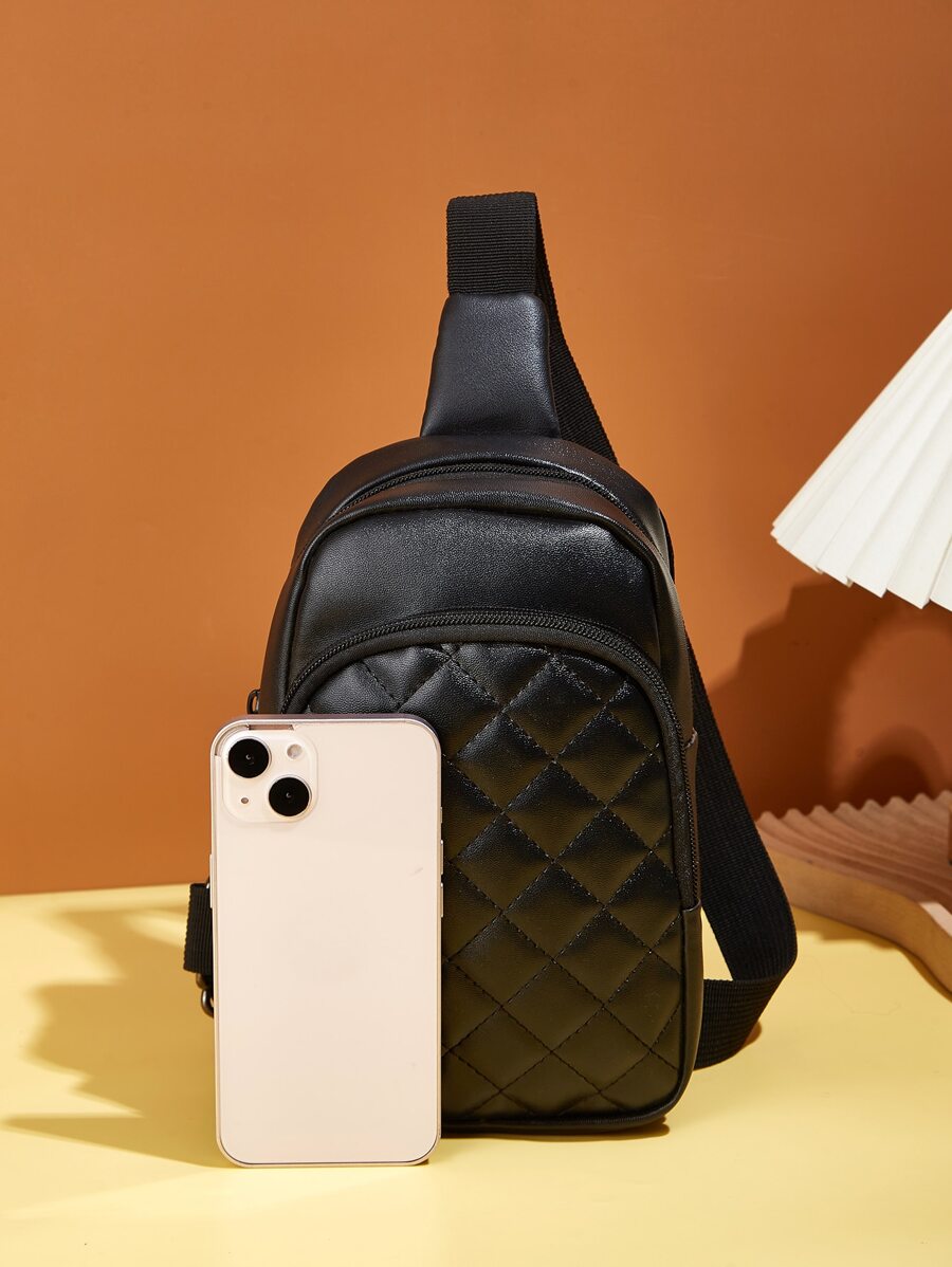 Mini Quilted Sling Bag Black quilted leatherette two-piece bag with zip ...