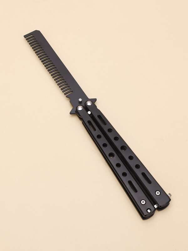 A black folding combination combat training comb, stainless steel ...