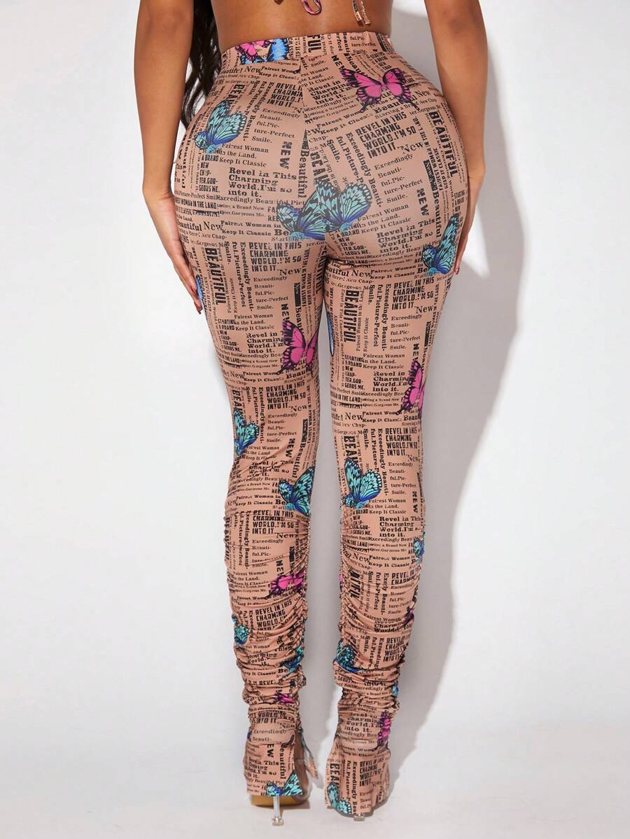 SHEIN SXY Leggings con farfalle e slogan plissettato orlo a fessura ...