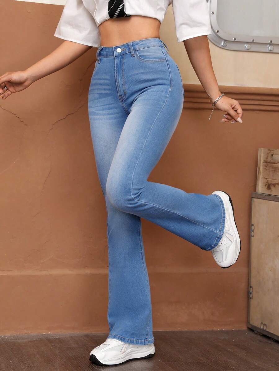 SHEIN EZwear Washed Denim Blue Solid Flare Leg Jeans | SHEIN USA