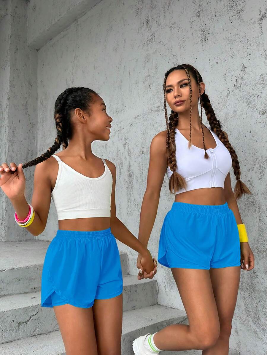 SHEIN Tween Girl Solid Elastic Waist Shorts With Phone Pocket | SHEIN USA