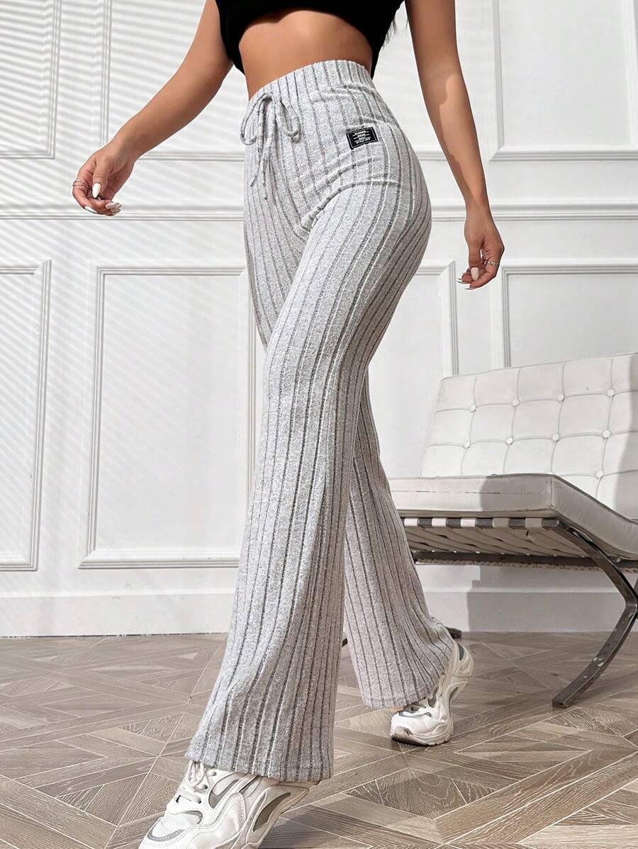 Flirla Letter Patched Detail Drawstring Waist Flare Leg Pants | SHEIN USA