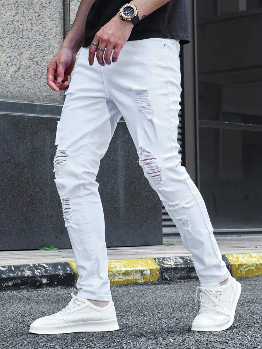 Manfinity Legnd Men Cotton Solid Ripped Tapered Jeans Frayed Plain Slim