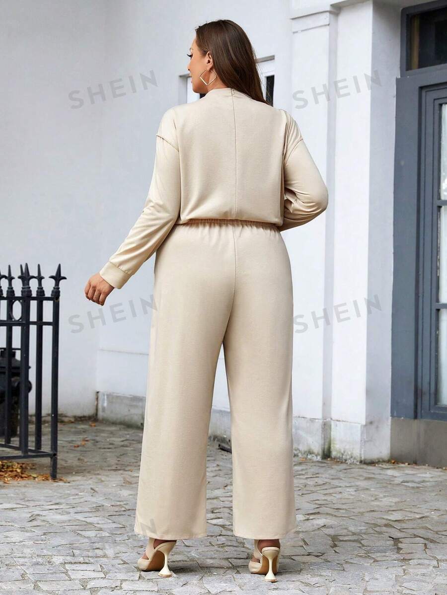 SHEIN Essnce Plus Size Wide Leg Jumpsuit With Outer Seams | SHEIN UK