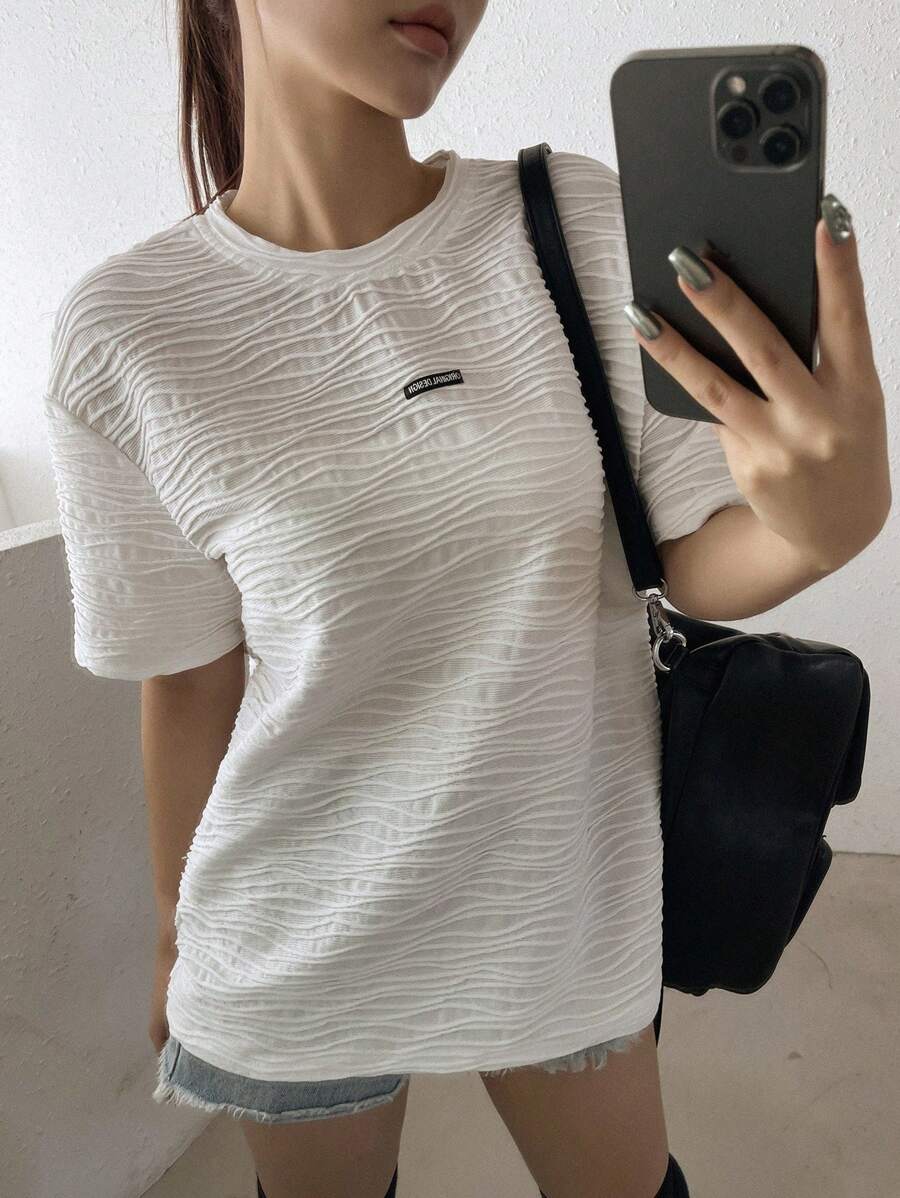 DAZY Getextureerd Tekst Geweven Labeldecoratie Ronde hals Los Korte mouwen Vrouwen T-shirts ...