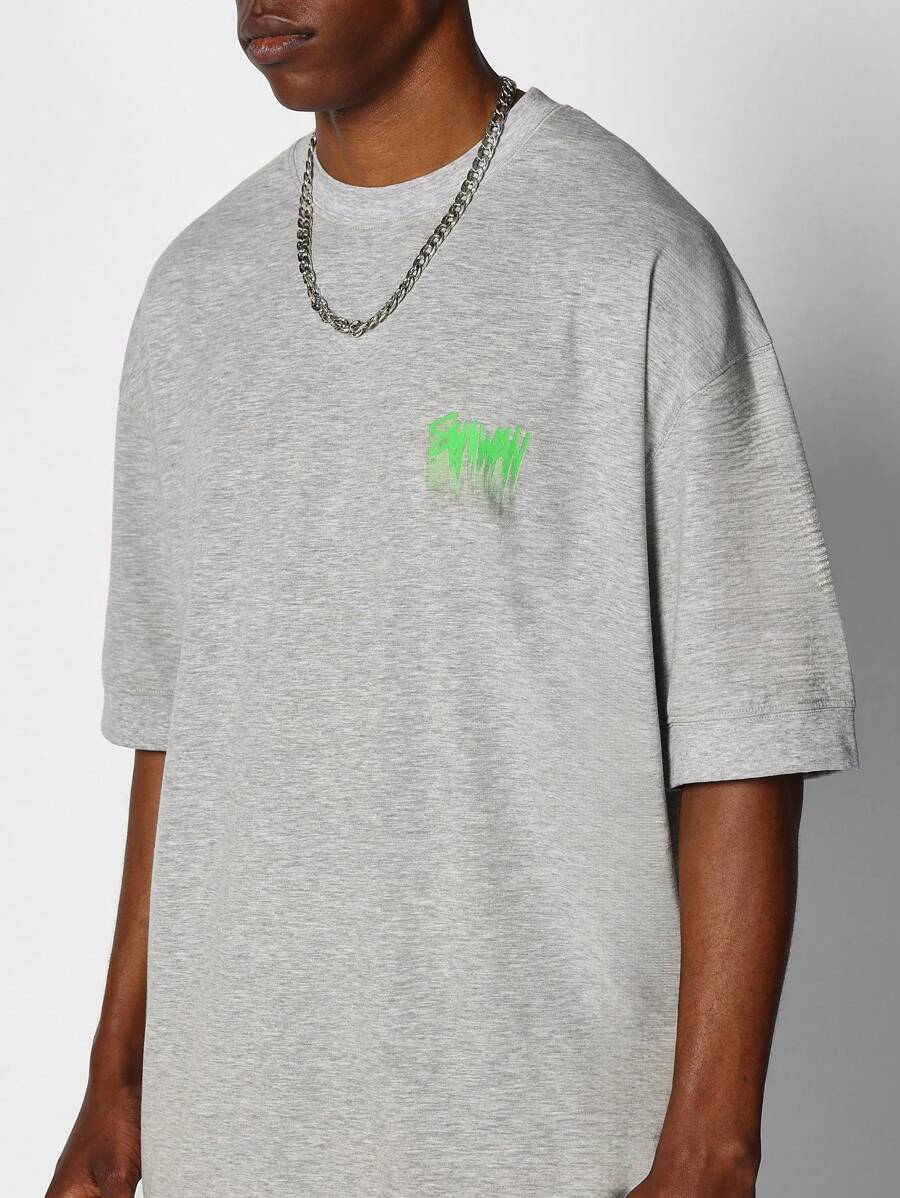 SUMWON Camiseta oversize con estampado gráfico delante y detrás | Moda ...