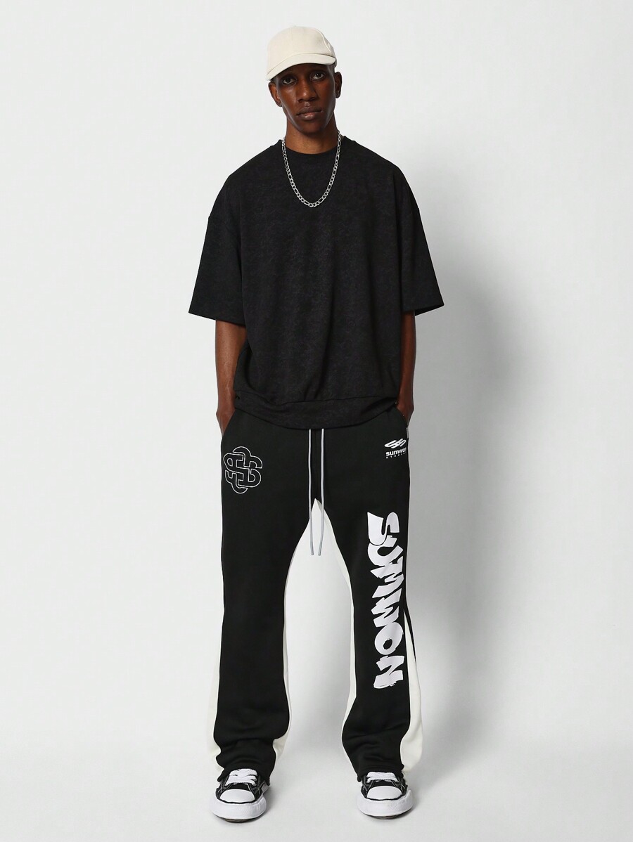 SUMWON Jogger de corte acampanado con estampado y paneles contrastantes ...