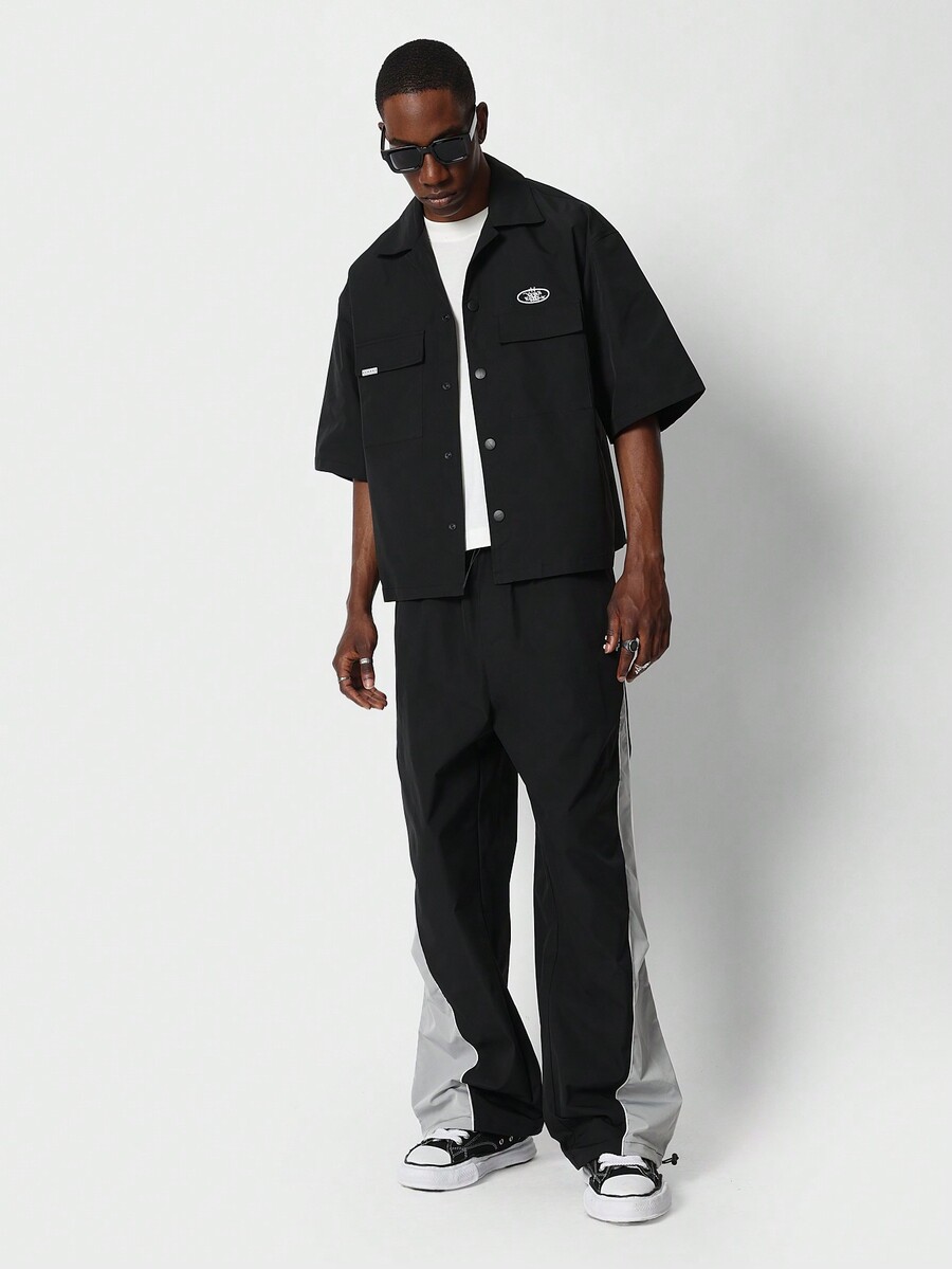 SUMWON เสื้อเชิ้ตกระเป๋าติดกระดุม ตัดทรงสี่เหลี่ยม ลายพิมพ์ลายหมากรุก ...