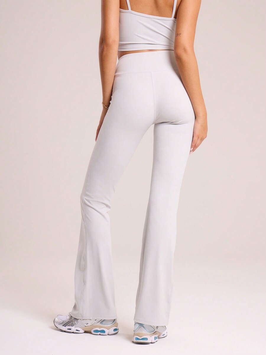 MUSERA Slinky Fit Flare High Waist Asymmetrical Seam Detail Trousers ...