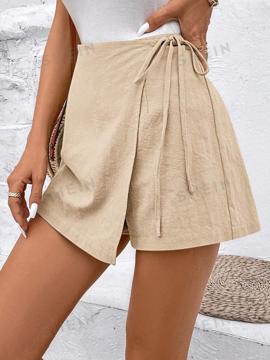 SHEIN Frenchy Solid Knot Side Wrap Bow Tie Wrap Mini Skort | SHEIN USA