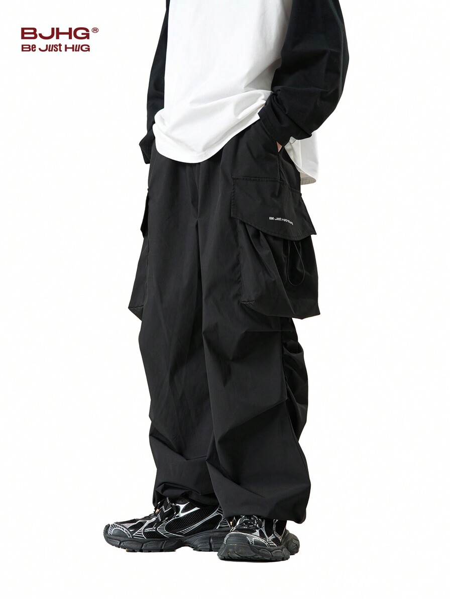 กางเกงอเนกประสงค์ขากว้างผู้ชาย BJHG พร้อมกระเป๋าขนาดใหญ่ กางเกงพลร่ม ...