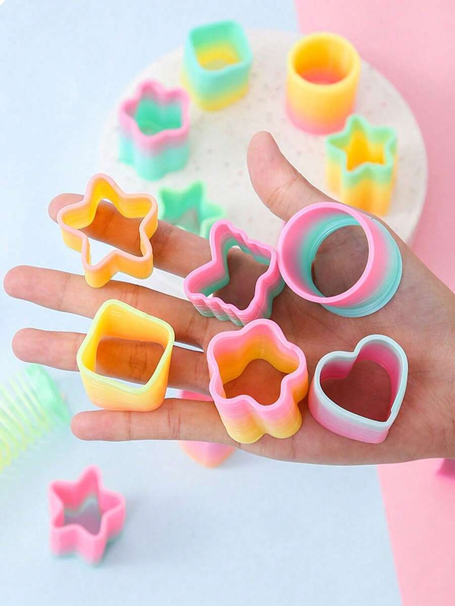 Set de 10 piezas de juguetes de resortes de colores aleatorios ...