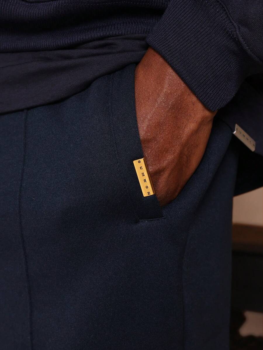 SUMWON Jogger de ajuste recto con entrepierna caída, súper premium y de ...