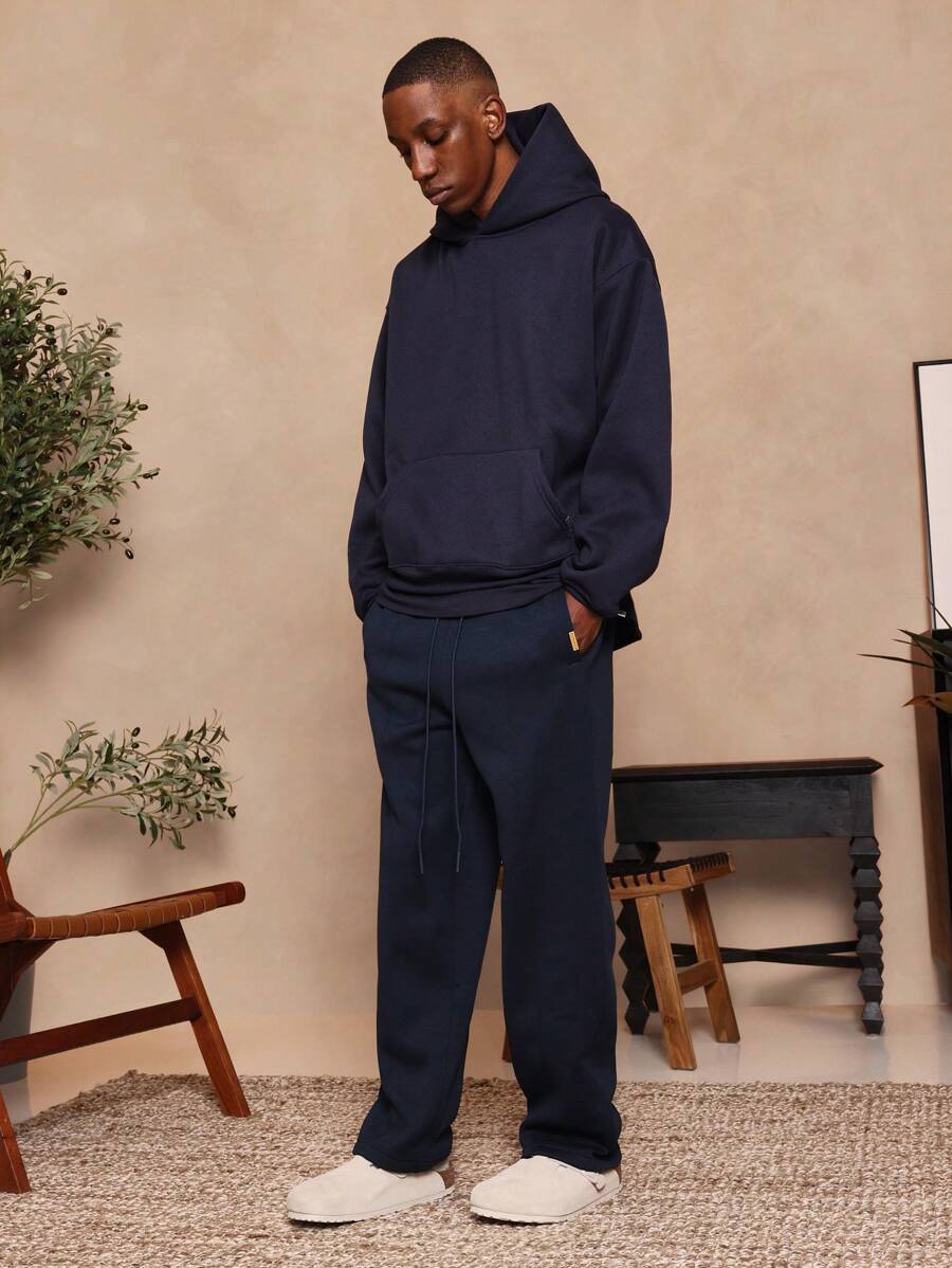 SUMWON Jogger de ajuste recto con entrepierna caída, súper premium y de ...