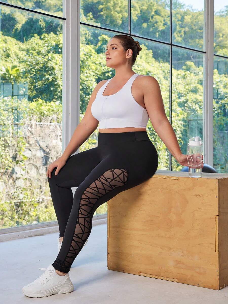 Pantalones deportivos negros ceñidos al Body con panel de malla para ...