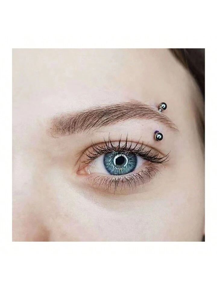 Double Eyebrow Piercings