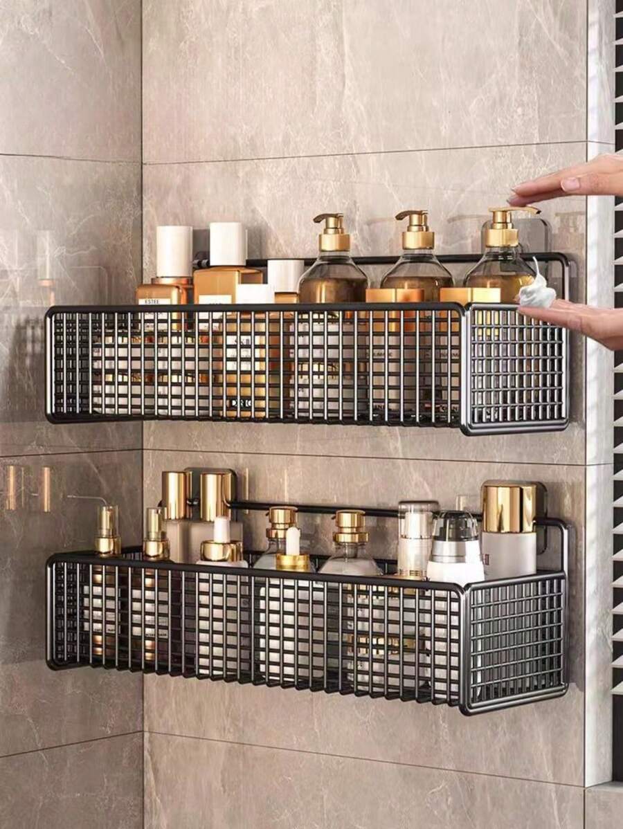 A hole-free bathroom with a black wall-mounted storage basket and a ...