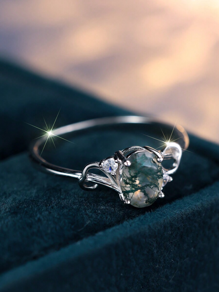 An Elegant Sterling Silver Oval Four-prong Irregular Aquatic Agate Ring ...