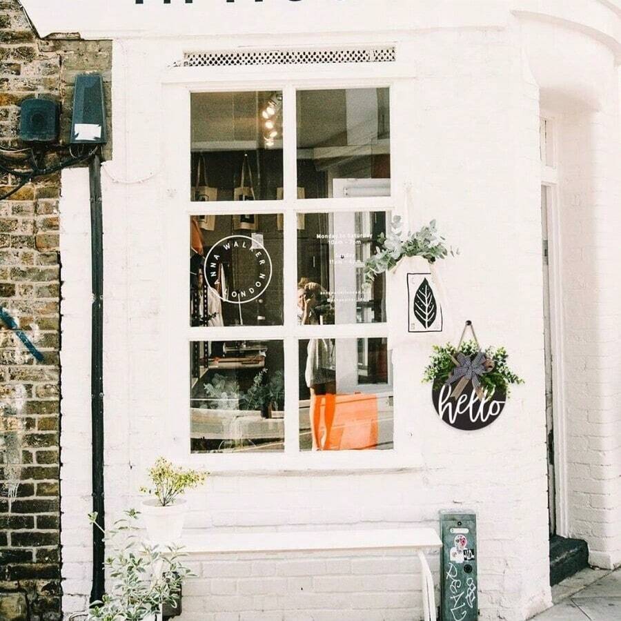 Welcome Sign Hello, Circular Wooden Sign Hanging On The Porch Of A ...