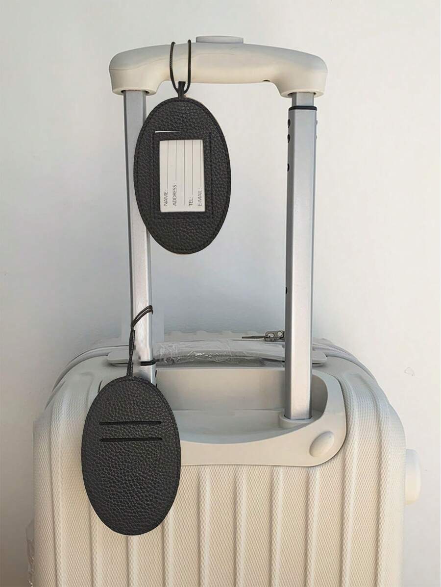 1 יחידה שחור אליפטי Creative מעופף תג מזוודה מזהה כתובת מחזיק מטען תג עלייה למטוס תיק תווית נייד ...