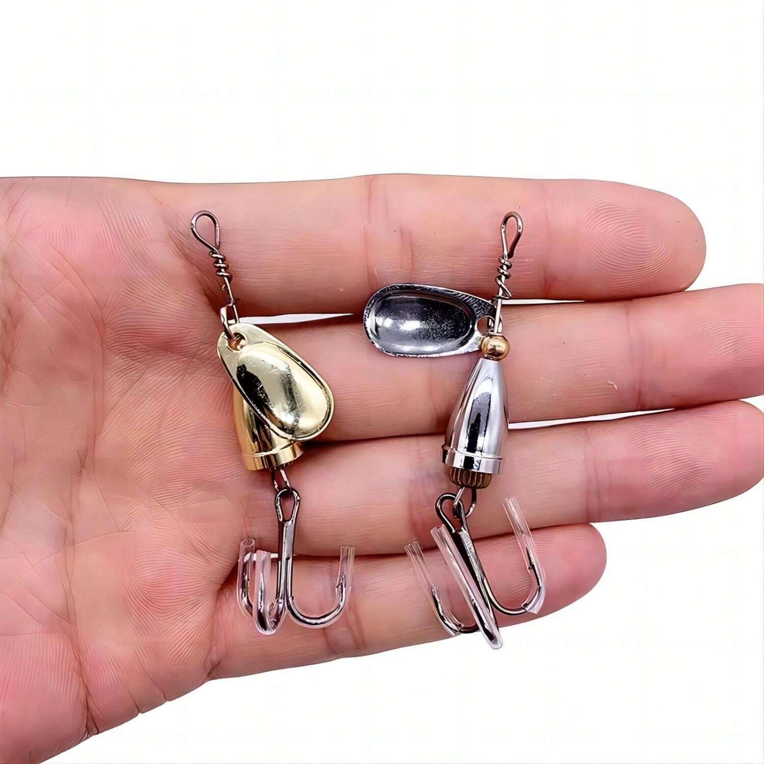Silver Spinner Bait With Holographic Sequins Mimicking Three Hook Lure With Upturned Mouth For