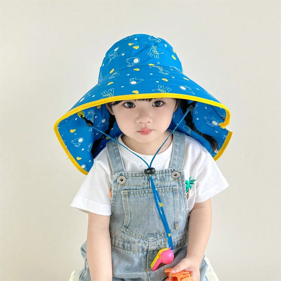 Un sombrero de pescador con estilo que protege del sol con borde ancho y un sombrero para niños ...