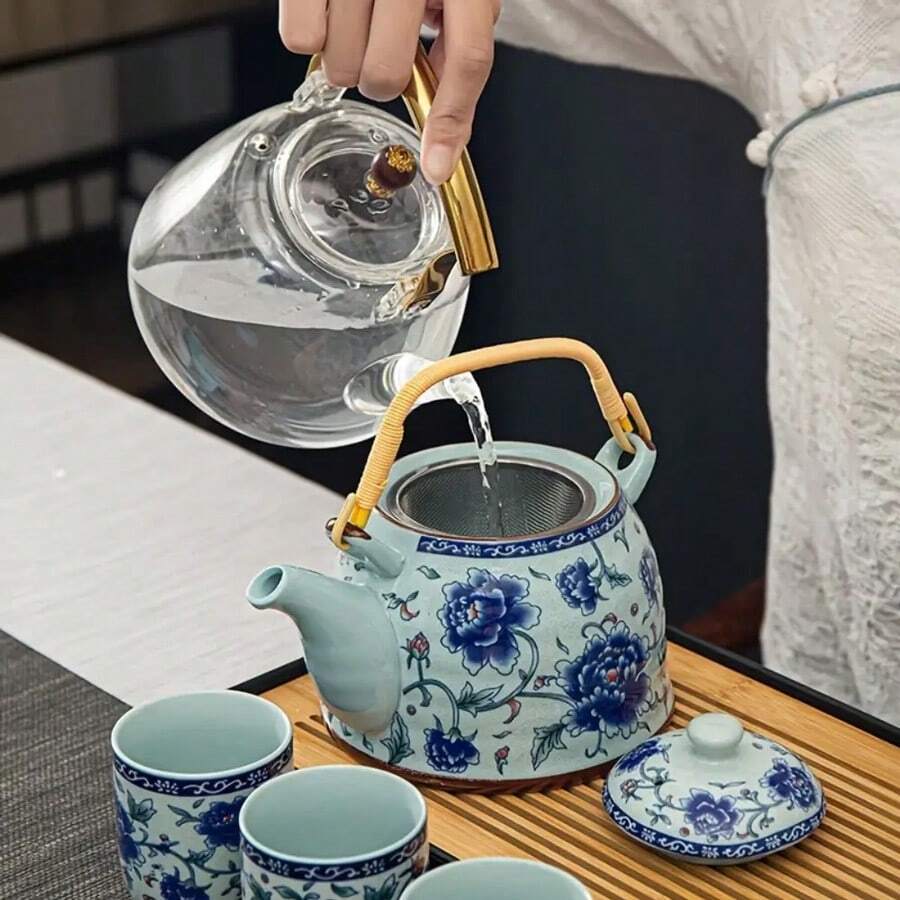 A Ceramic Teapot Set With Tea Cups For Home Use, Including A Blue And ...