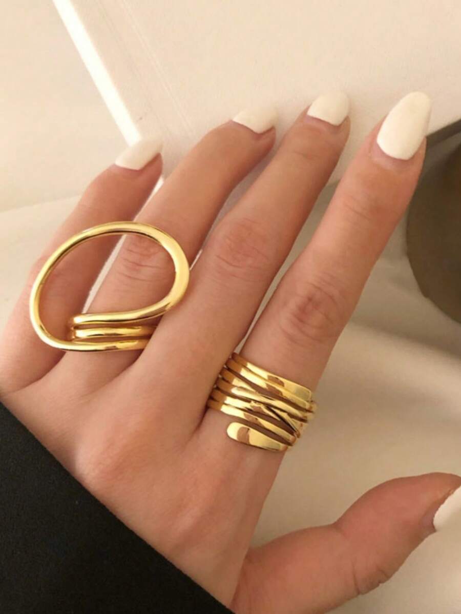 2 piezas de anillos amplios de línea abierta bañados en oro simple y ...