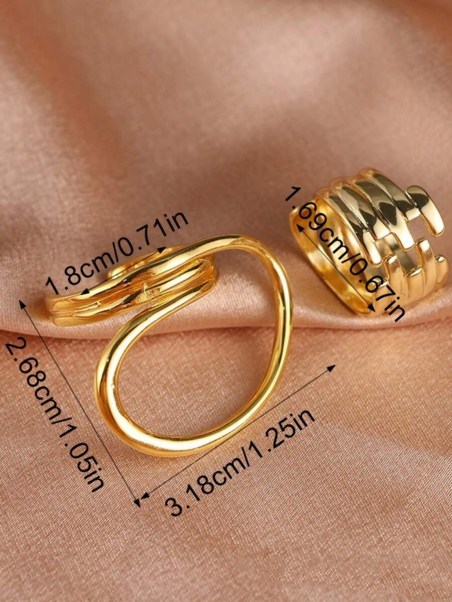 2 piezas de anillos amplios de línea abierta bañados en oro simple y ...