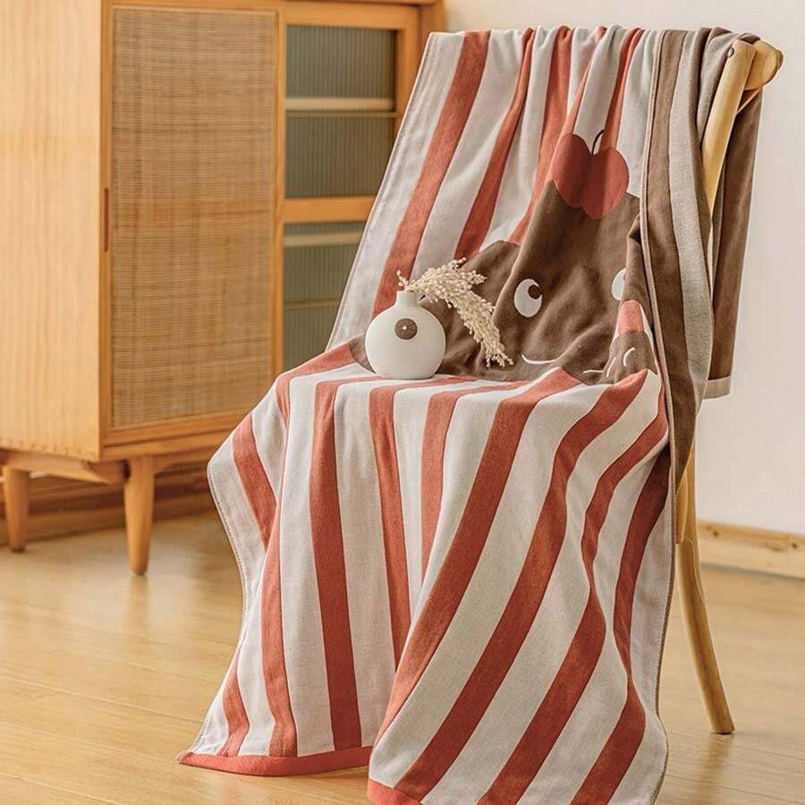 Una coperta indossabile intessuta, coperta da spiaggia carina e ...