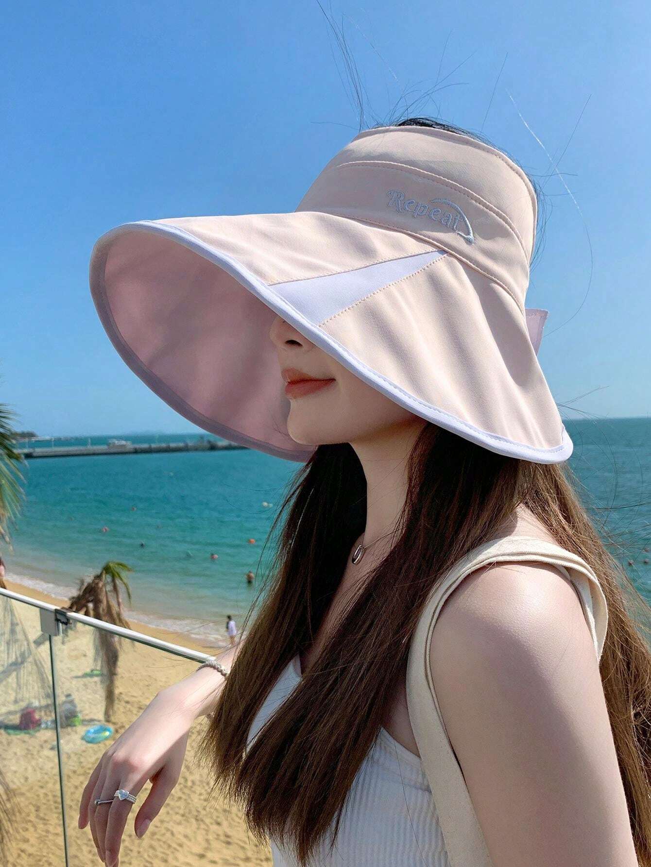 One Fashionable And Versatile Sun Hat With A Large Brim, Featuring A ...