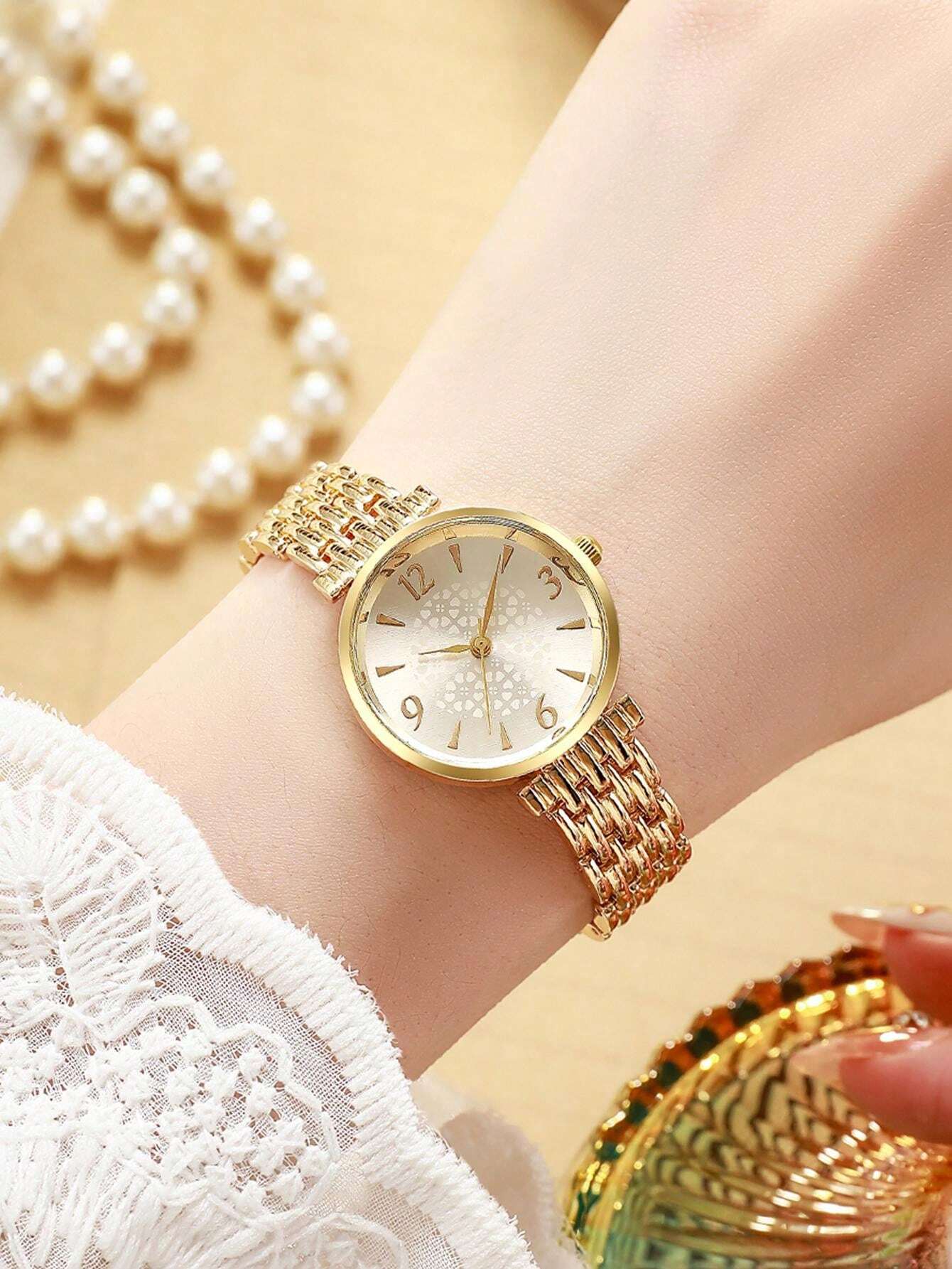 Reloj cuarzo con esfera en forma de copo de nieve y números arábigos ...