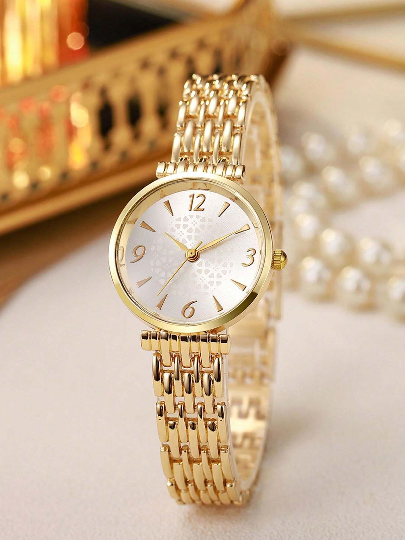 Reloj cuarzo con esfera en forma de copo de nieve y números arábigos ...