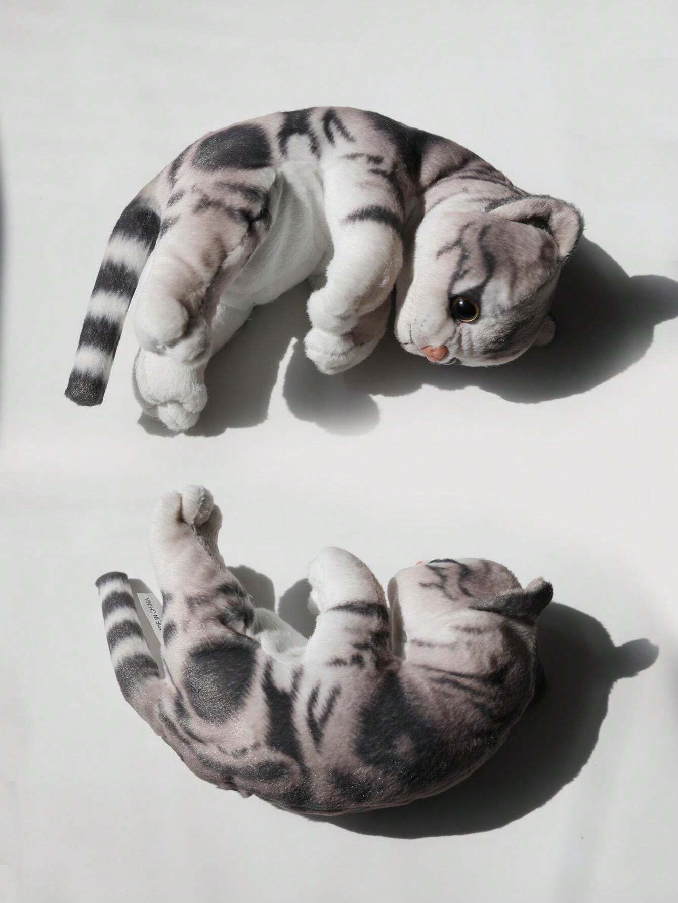 A Soft And Lifelike Plush Toy Of A Small Dog Or Cat, With Different ...