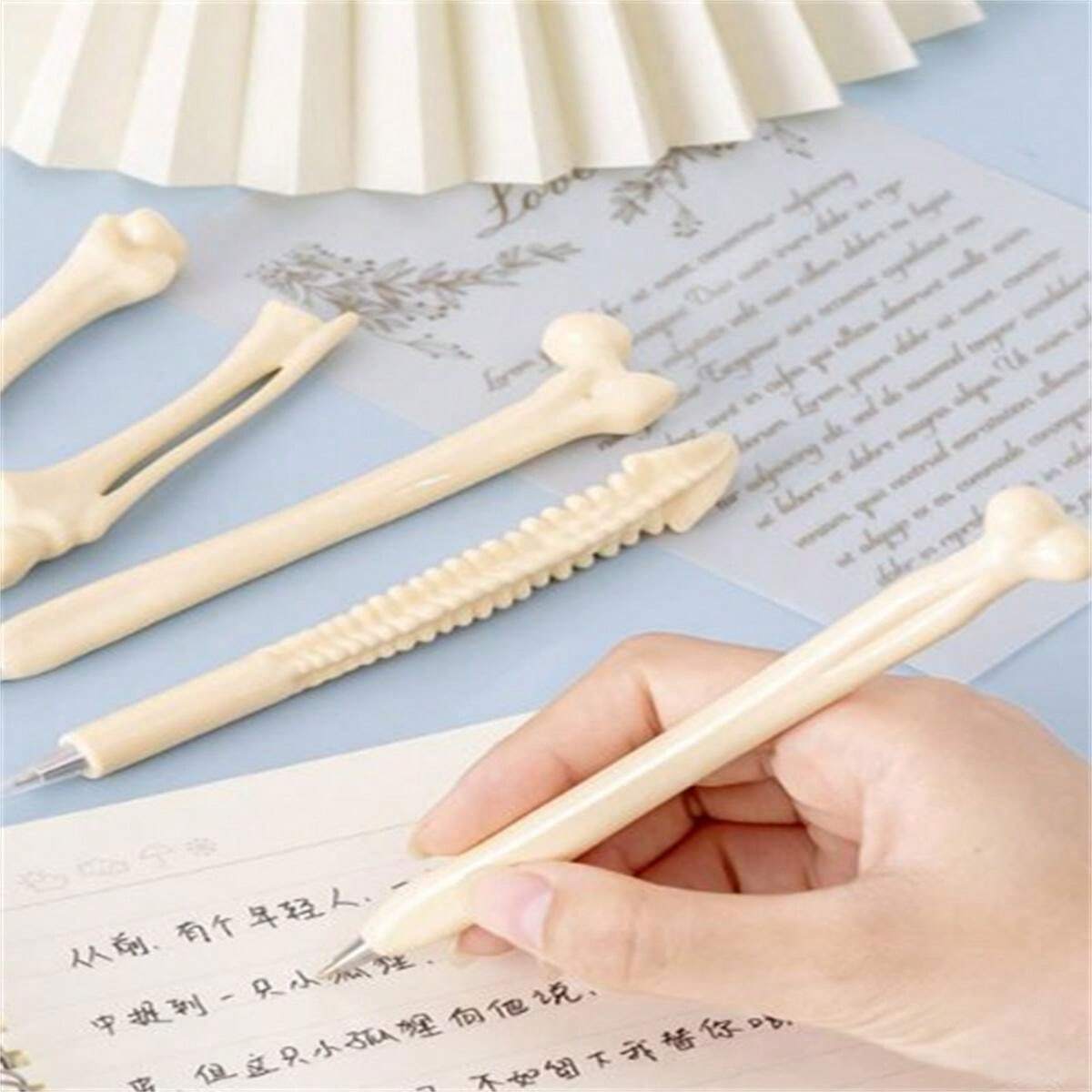 Nueva pluma de bola con forma de hueso irregular y novedosa, con tinta ...