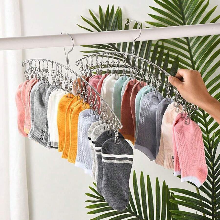 The Multifunctional Clothes Hanger Made Of Stainless Steel Material Is ...