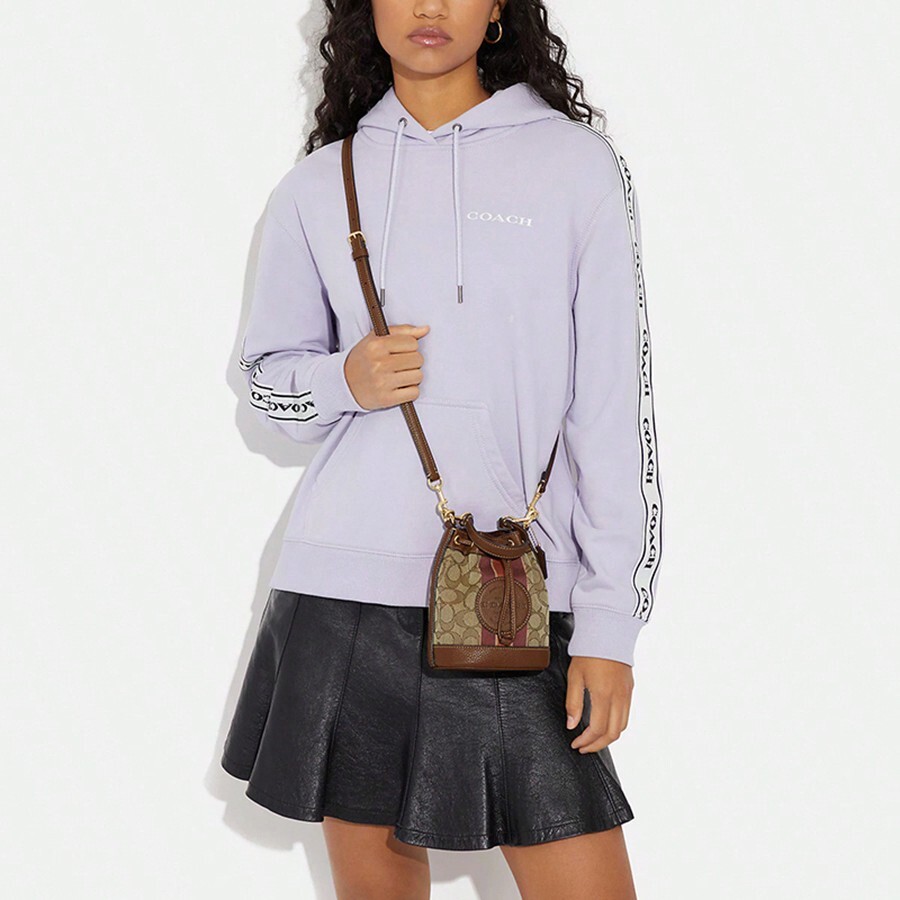 Coach Mini bolso de cubo con cordón Dempsey en jacquard con bordado de ...