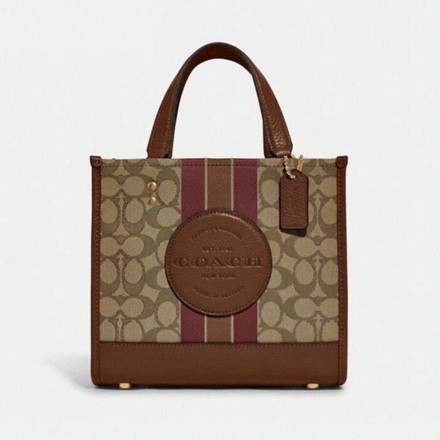 Coach Bolsa de tote y de hombro Dempsey 22 en jacquard con firma con ...