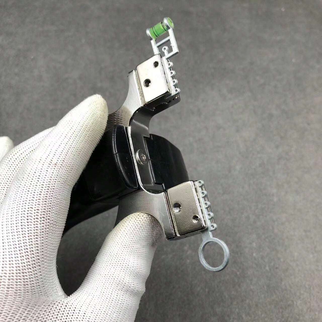 Una resortera de gran poder con mango negro, de alta precisión y ...