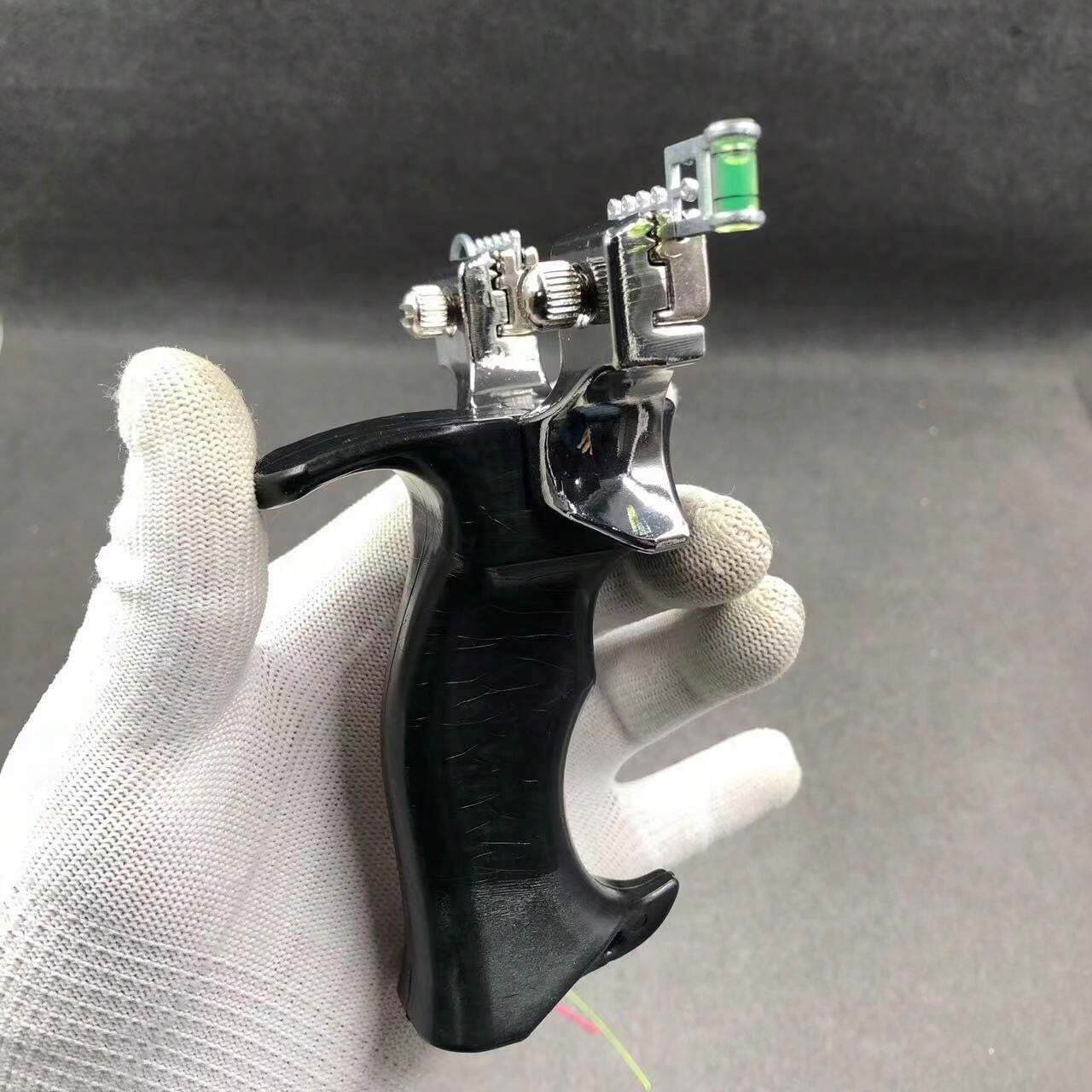 Una resortera de gran poder con mango negro, de alta precisión y ...