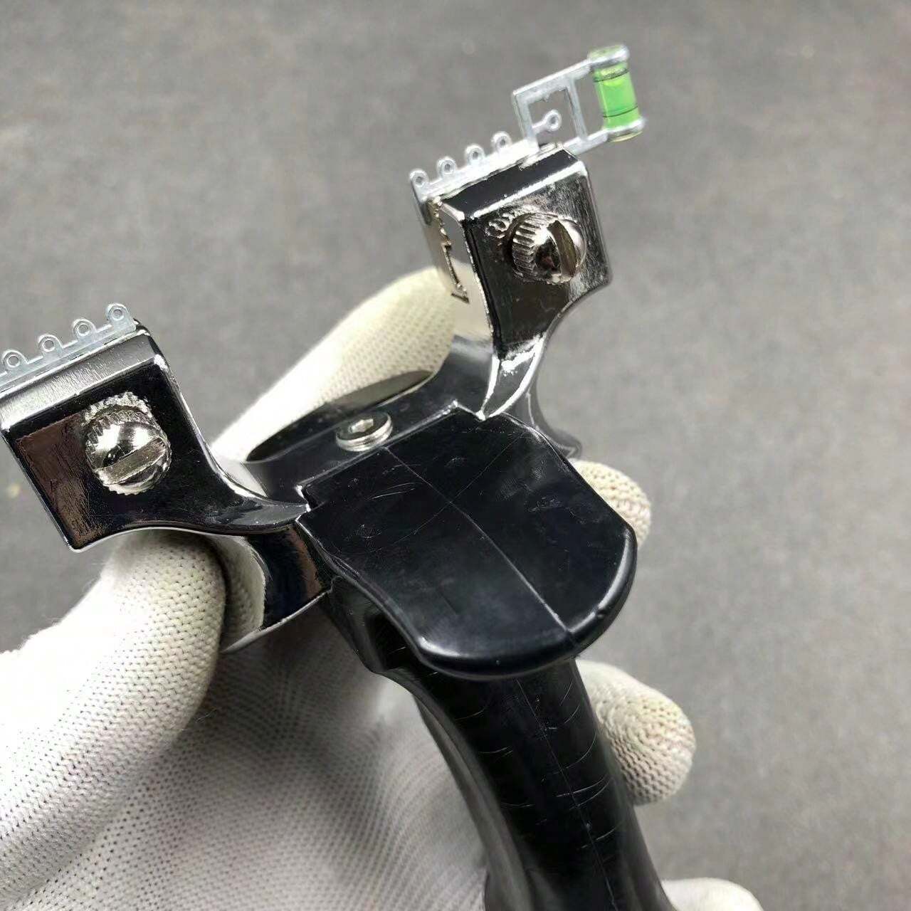 Una resortera de gran poder con mango negro, de alta precisión y ...