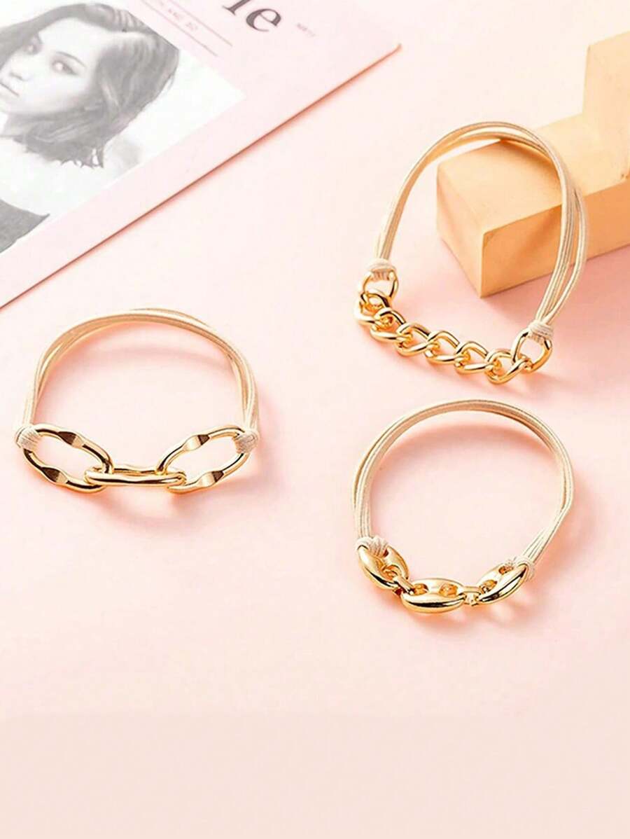 Le bracelet serre-tête est fabriqué en métal et corde élastique pour ...