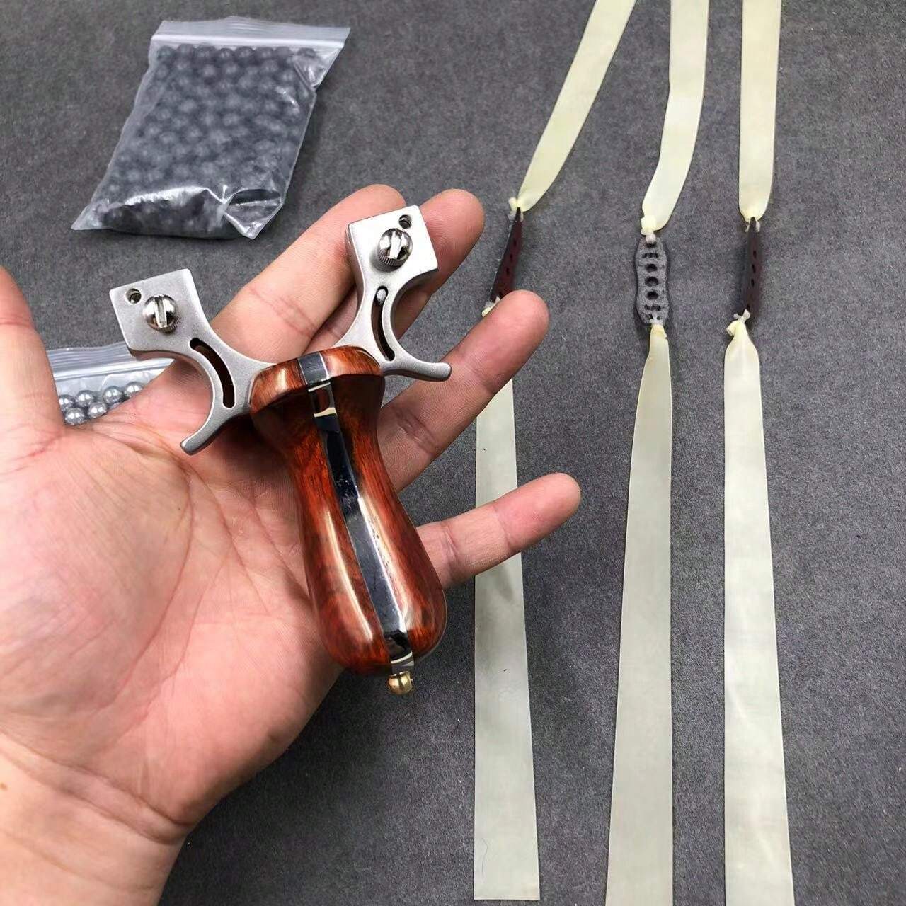 Högkvalitativ 1 slangbella 3 gummiband 1 påse stålkulor 1 påse ...