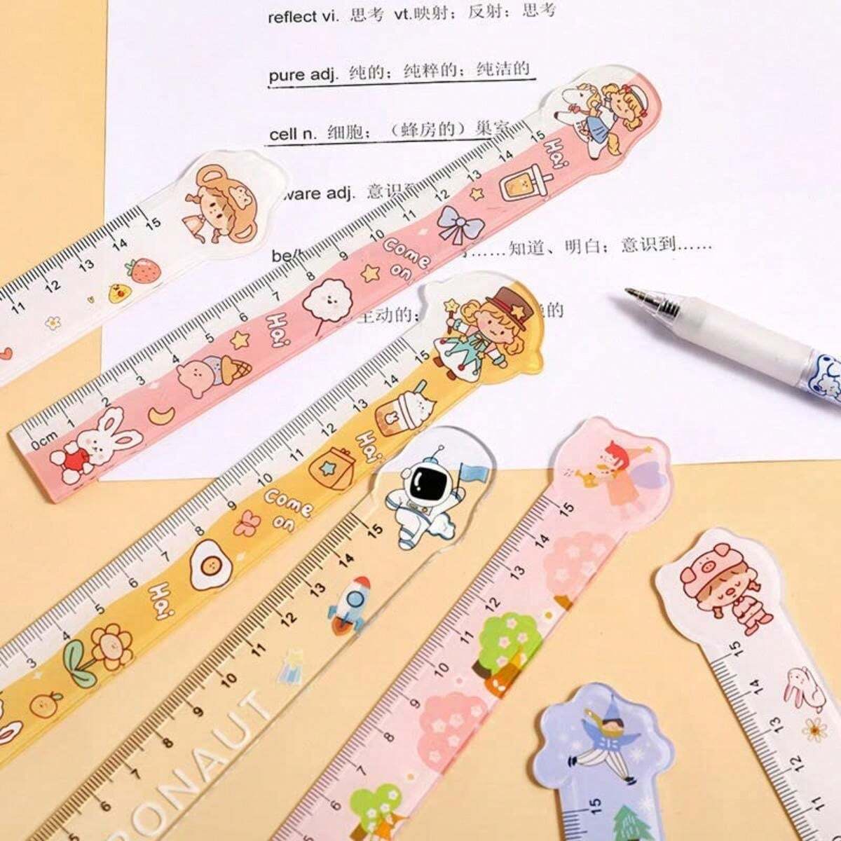 Regla de cartón adorable y aleatoria, fabricada de plástico. Es una ...